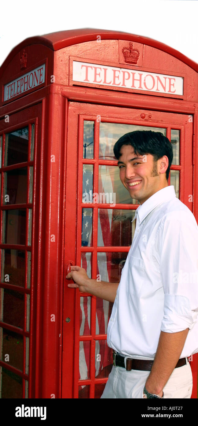 Red BritishTelephone Booth and Young Man Entering Stock Photo - Alamy