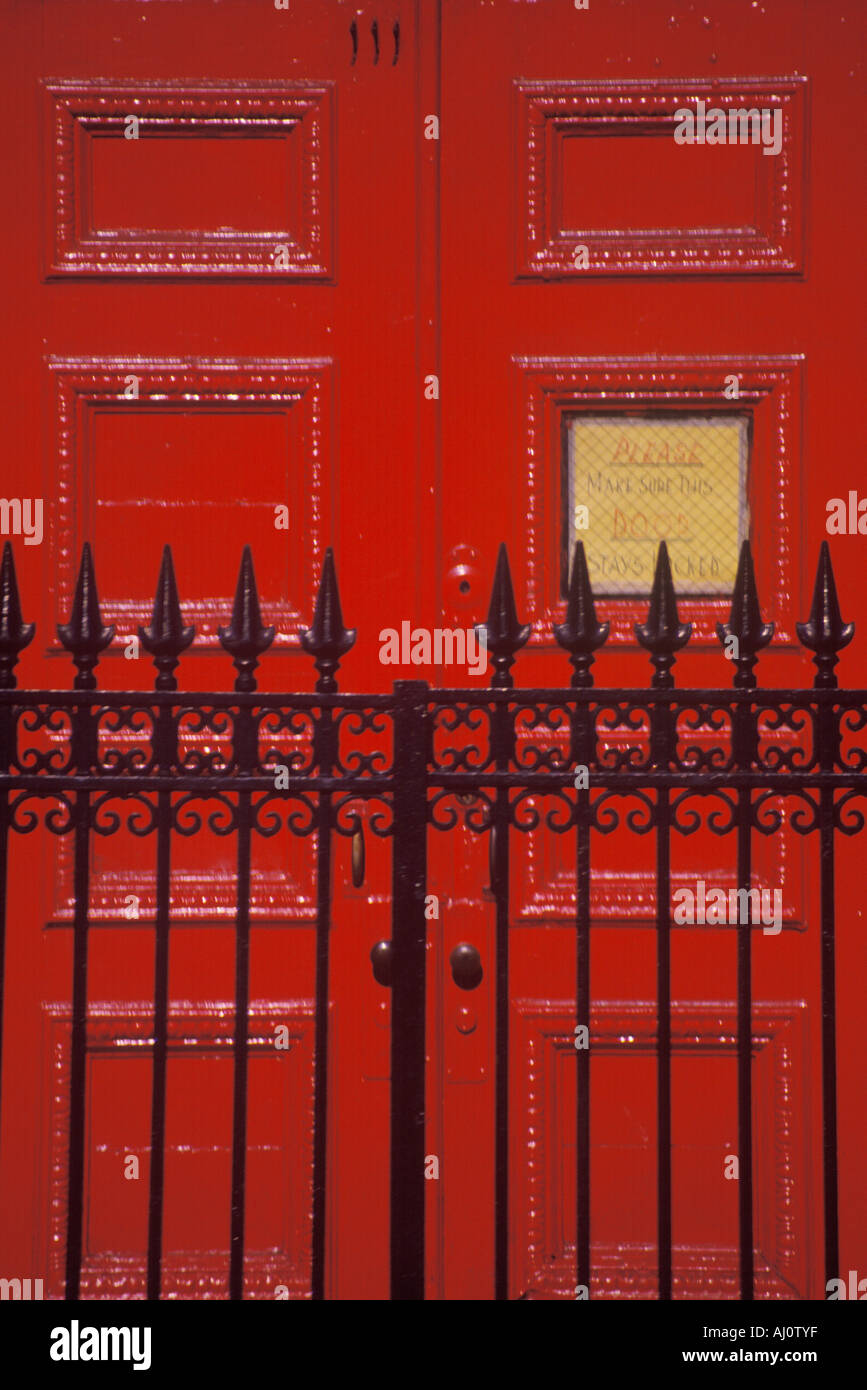 Red door and wrought iron gate at a West Village Boarding School NY ...