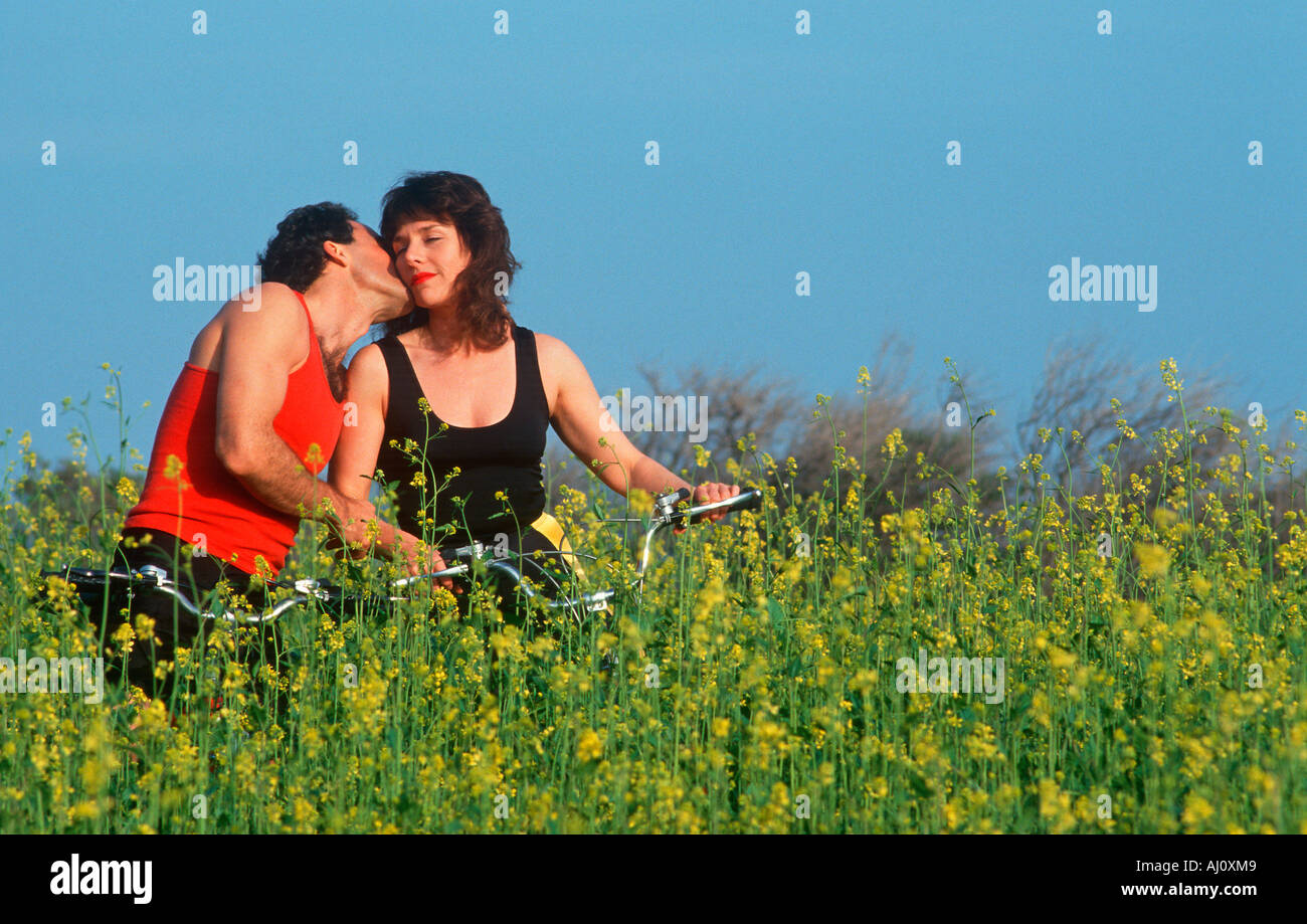 A couple kissing on a bike ride Malibu CA Stock Photo - Alamy