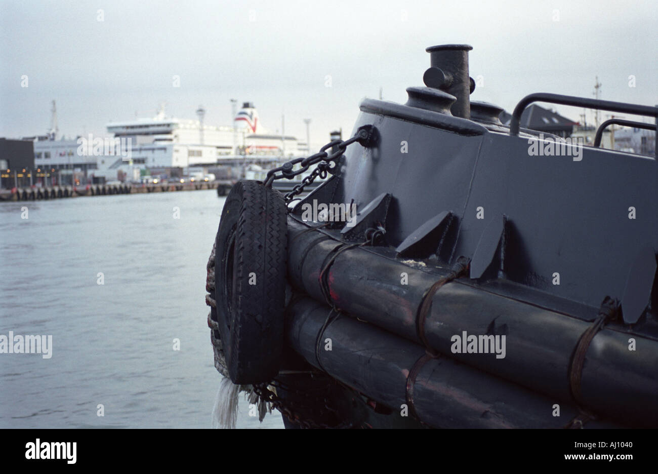 Tug boat bow fender Stock Photo - Alamy