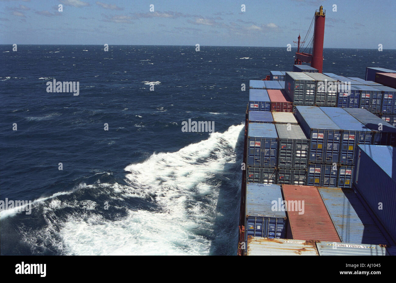 Container vessel rushing through the sea Stock Photo - Alamy
