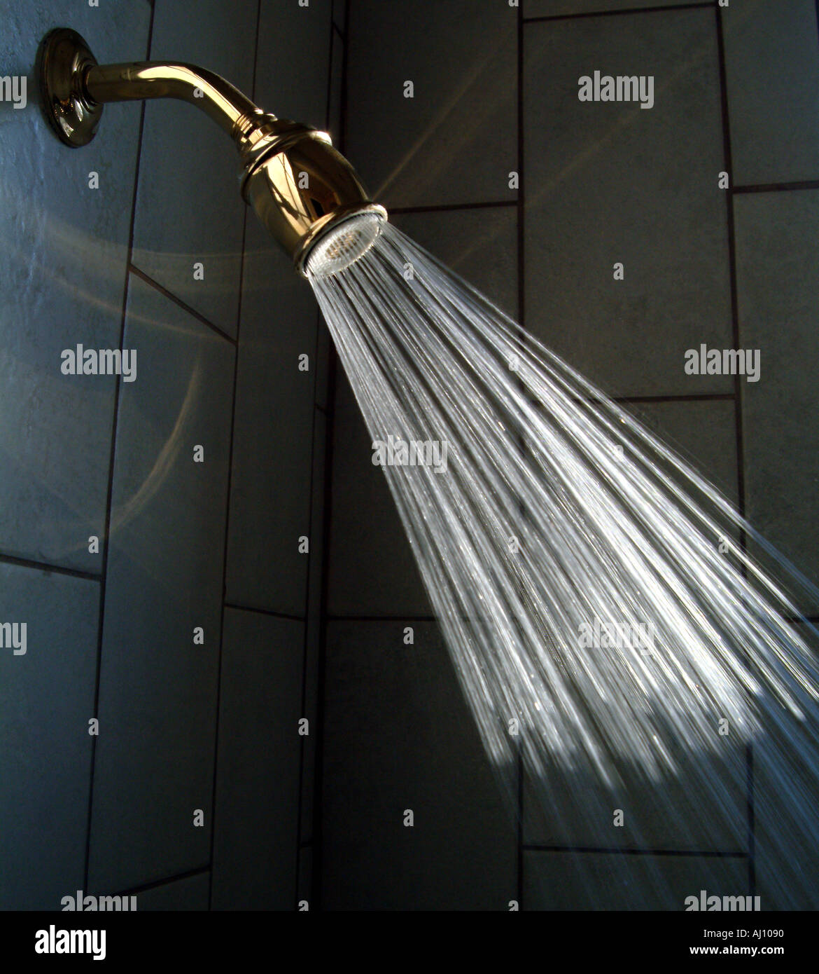 Shower spraying water Stock Photo - Alamy