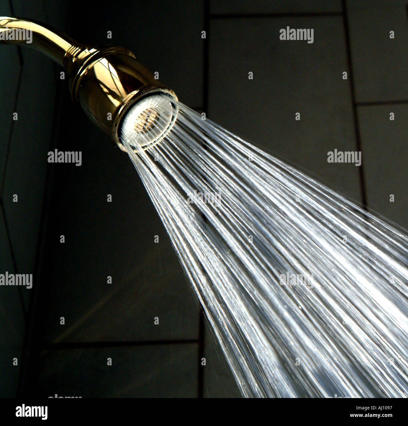 Shower spraying water Stock Photo - Alamy