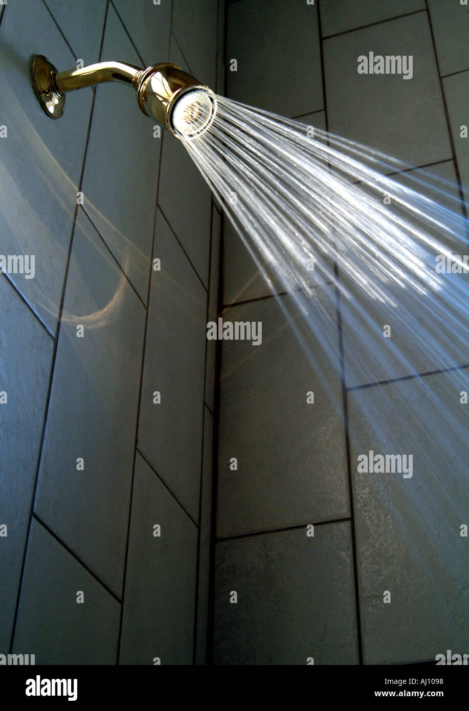 Shower spraying water Stock Photo - Alamy