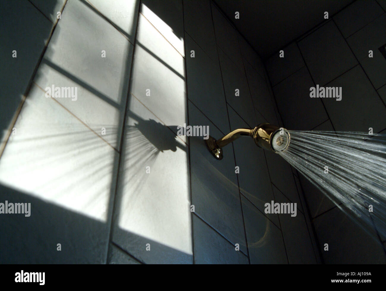 Shower spraying water Stock Photo - Alamy