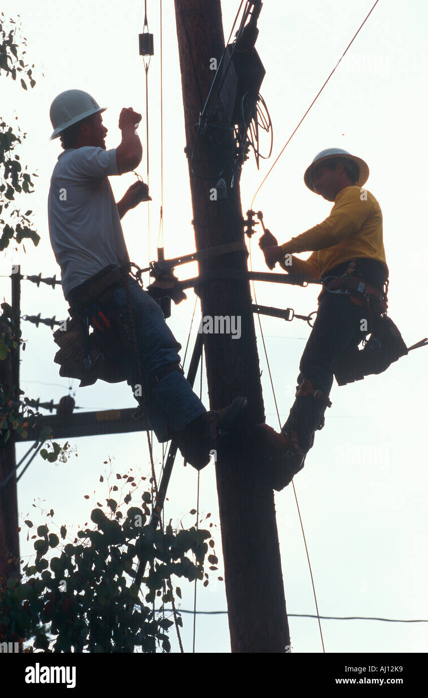 Telephone repairmen pole hi-res stock photography and images - Alamy