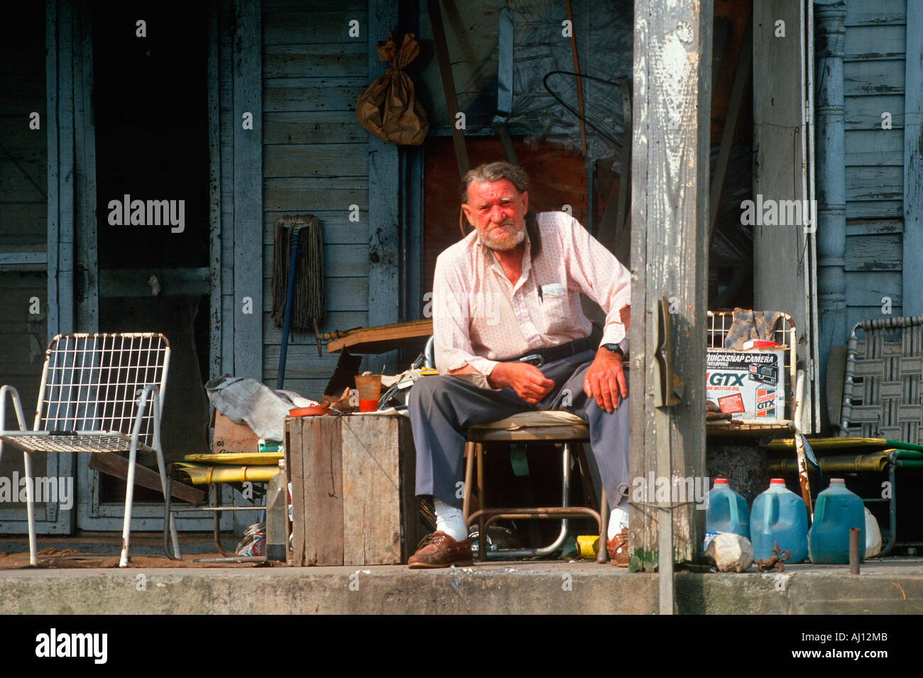 An elderly man on his front porch Appalachia VA Stock Photo - Alamy