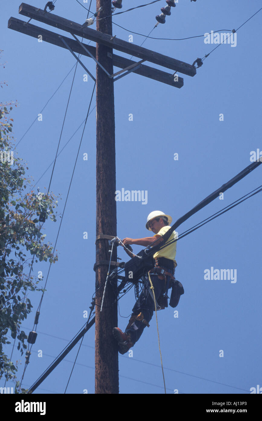 Telephone pole worker hi-res stock photography and images - Alamy