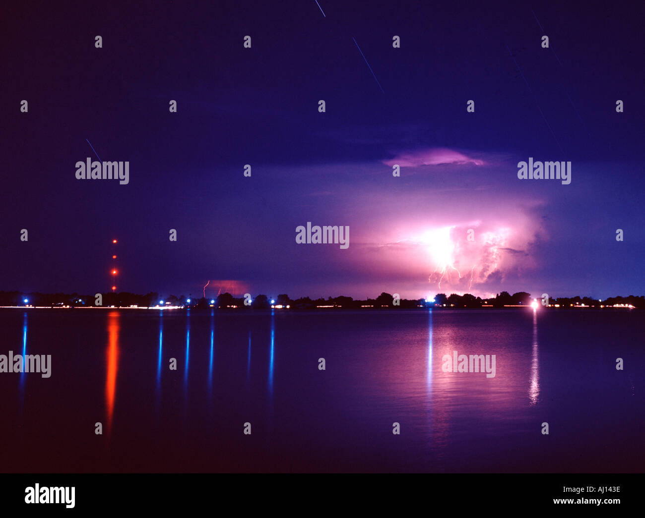 lightning bolts striking shoreline in Florida USA Stock Photo - Alamy