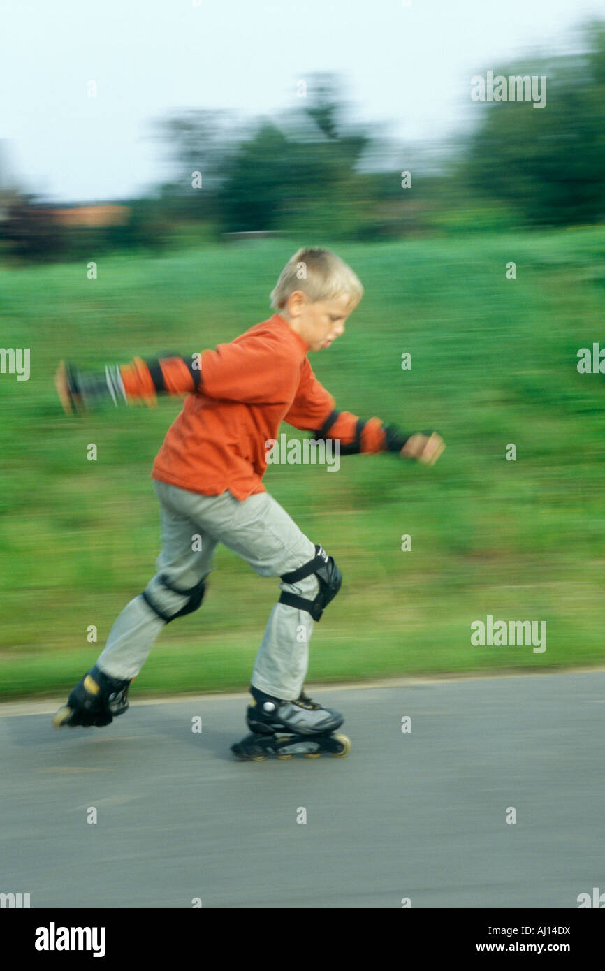 young boy skating Stock Photo - Alamy
