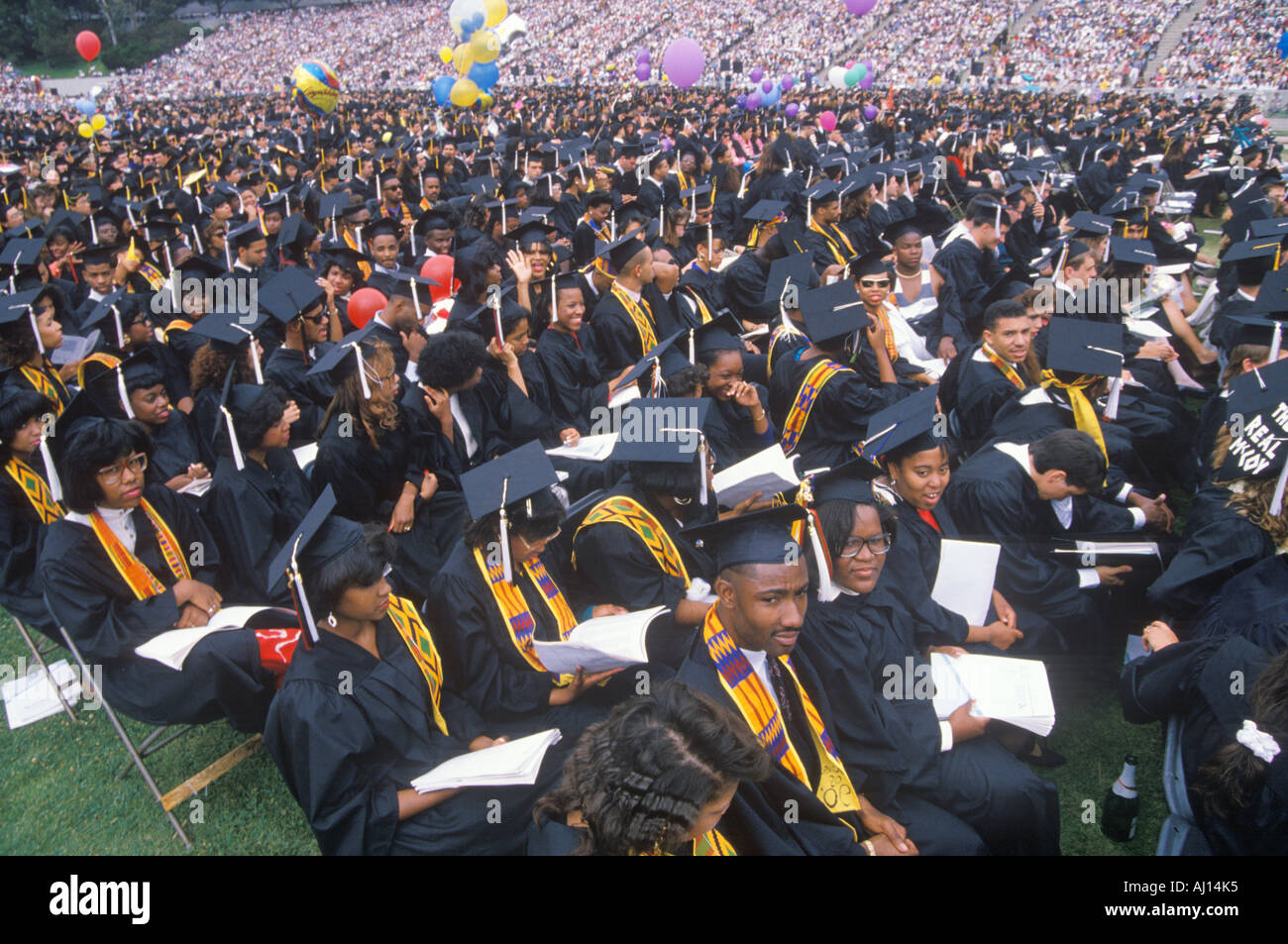 A group of multi ethnic graduates at their graduation ceremony UCLA LA ...