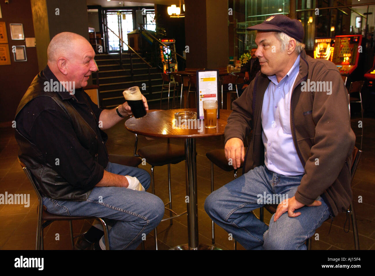 Two local men drinking beer in The Gatekeeper pub in Cardiff South ...