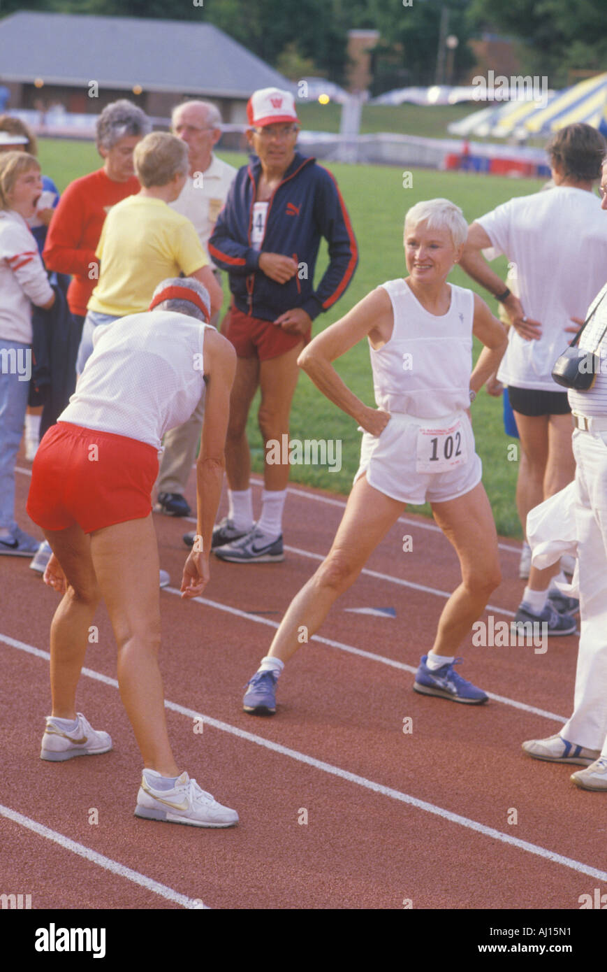 Female runners stretching before a race at the Senior Olympics St Louis ...
