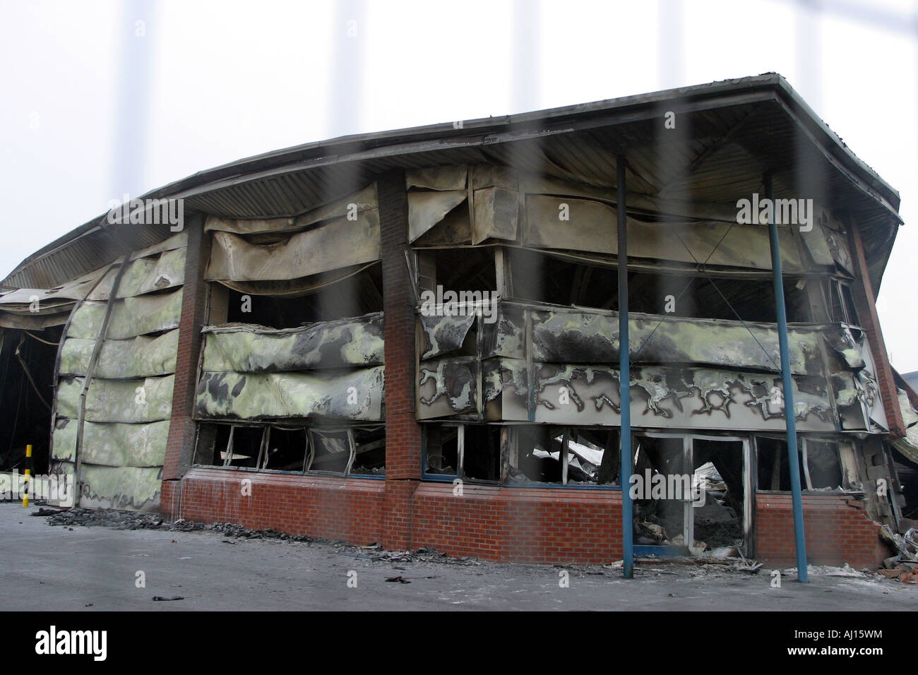 building damaged by fire total loss melted unsage Stock Photo - Alamy