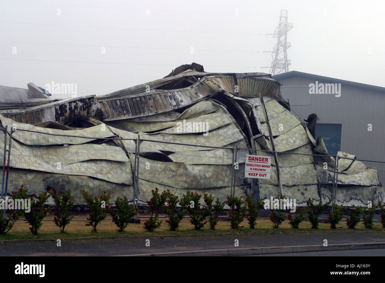 danger keep out sign warning of a building severely damaged by fire ...