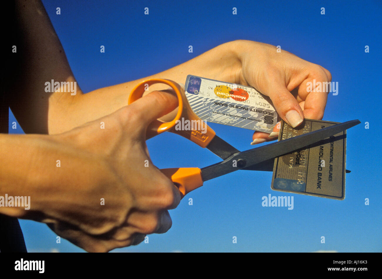 Cutting up credit cards hi-res stock photography and images - Alamy