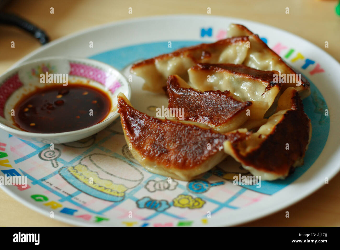 Picture of Gyoza w/ soy sauce Stock Photo - Alamy