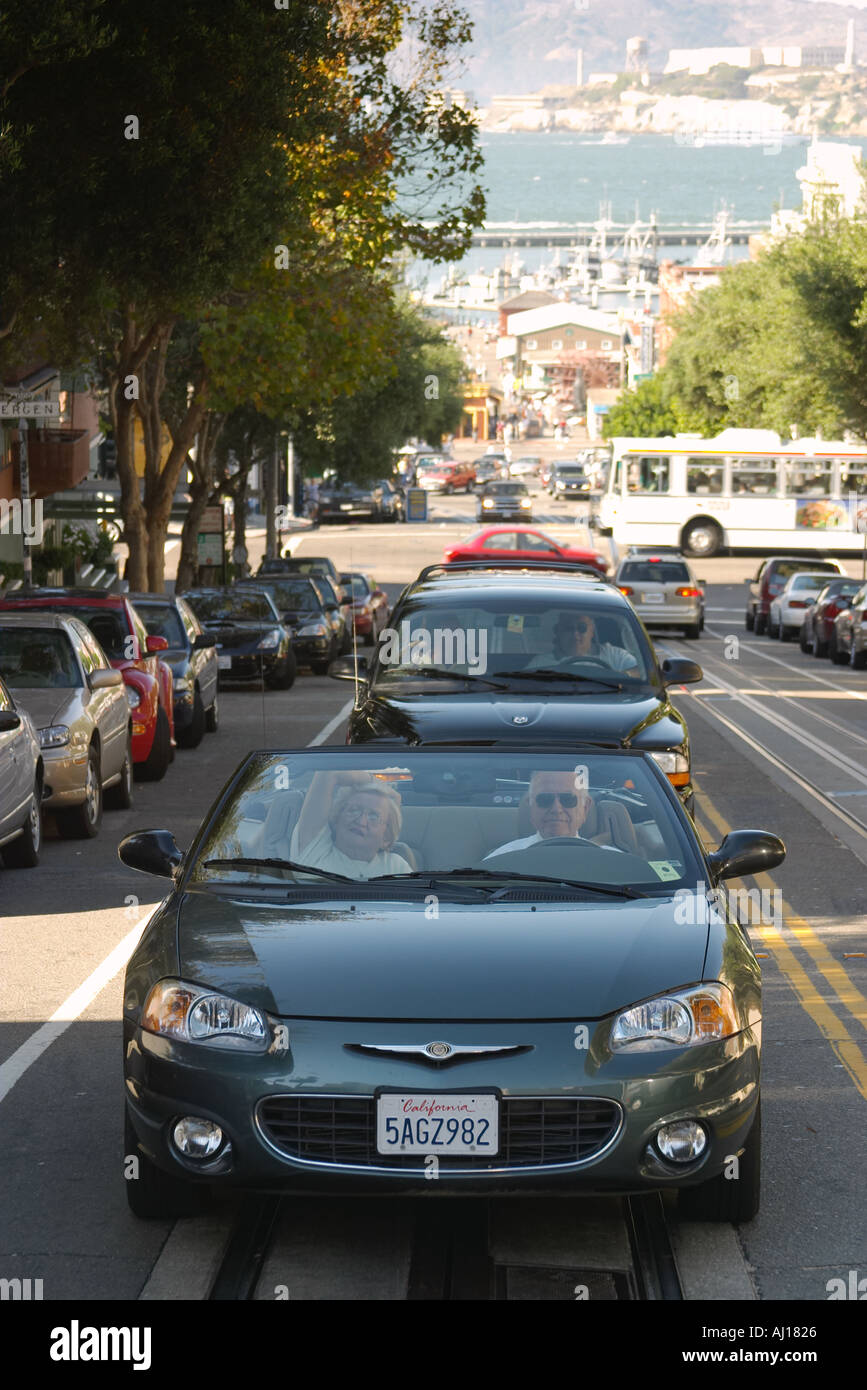 CALIFORNIA San Francisco Cars drive over cable car tracks look down ...