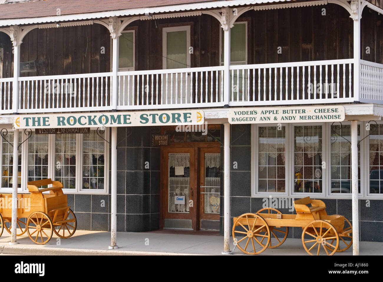 ILLINOIS Arcola Rockome Store front on Main Street wagons on sidewalk ...