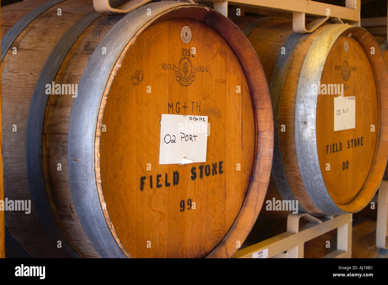 CALIFORNIA Alexander Valley Wooden wine barrels on rack Field Stone ...