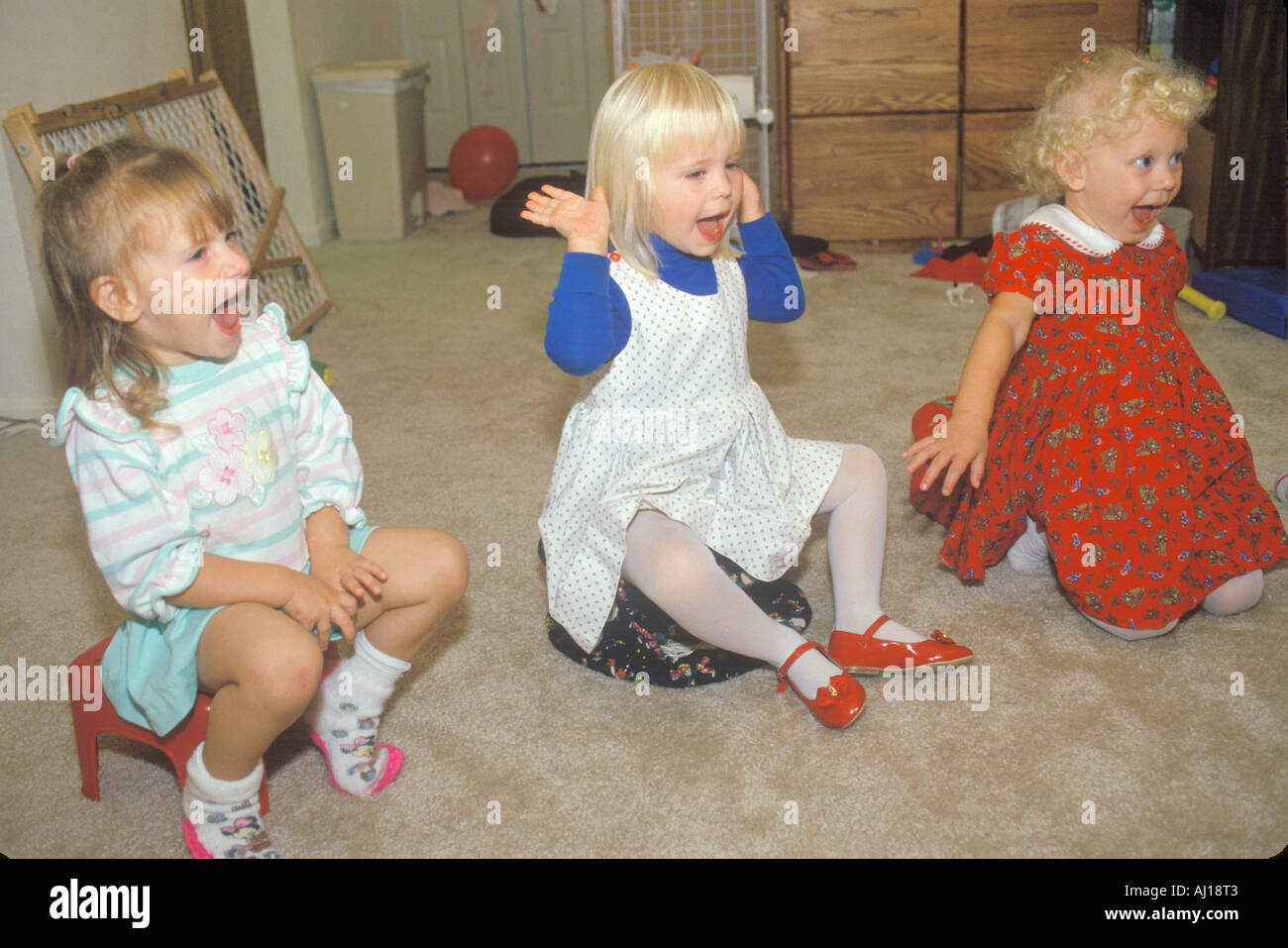Three preschool girls singing at their daycare center Washington D C ...