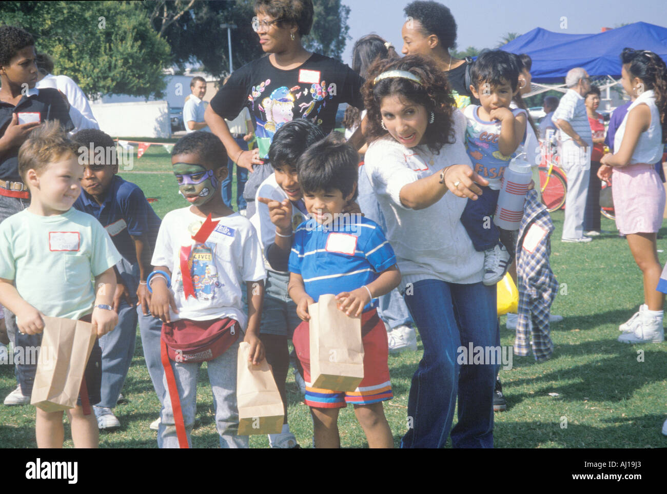 Children playing at a school function Stock Photo - Alamy