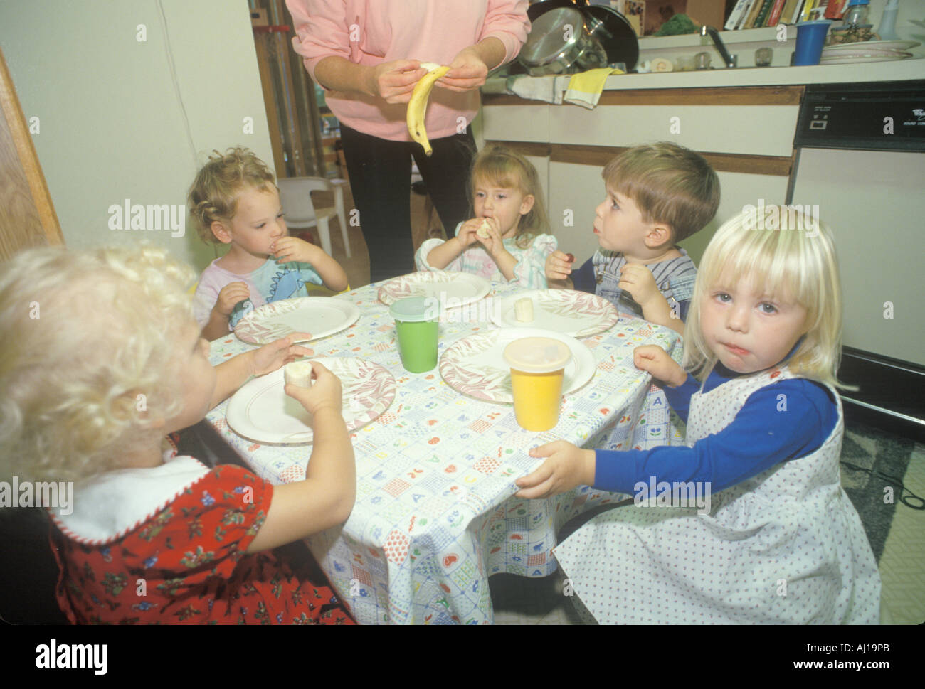 Preschool children eating breakfast Washington D C Stock Photo - Alamy