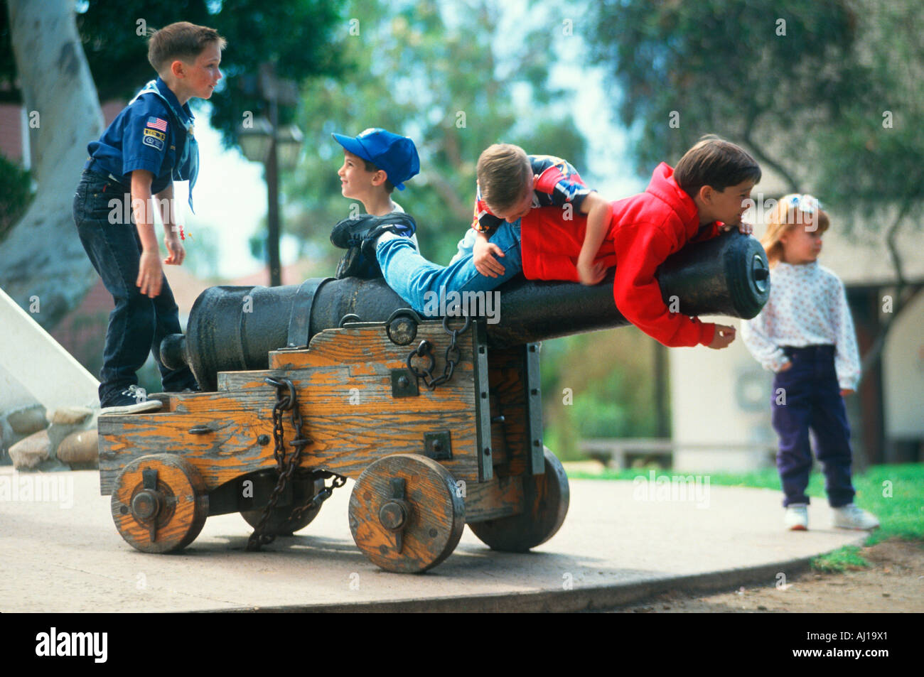 Cub Scouts playing on a historical cannon Stock Photo - Alamy