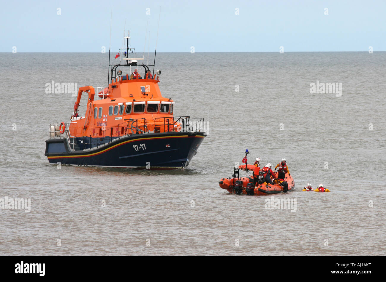 RNLI dinghy rescue with Severn Class on stand-by Stock Photo - Alamy