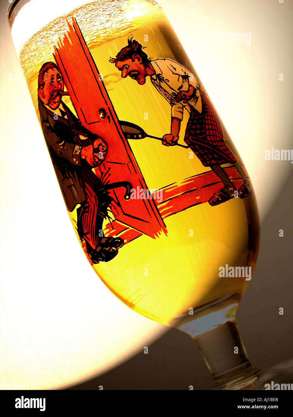 glass of beer with a funny picture Stock Photo - Alamy