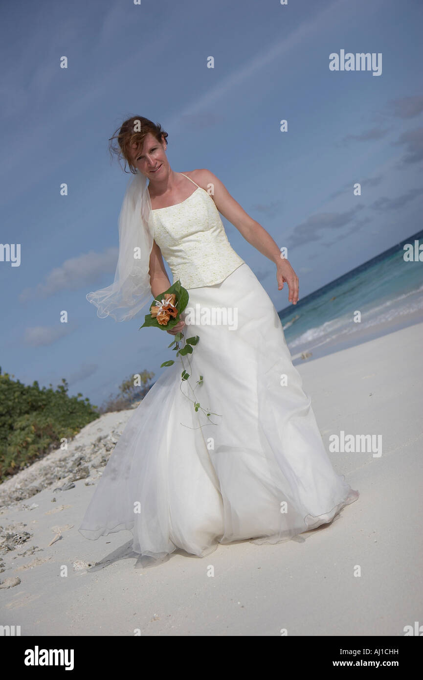 bride walking on the beach Stock Photo - Alamy