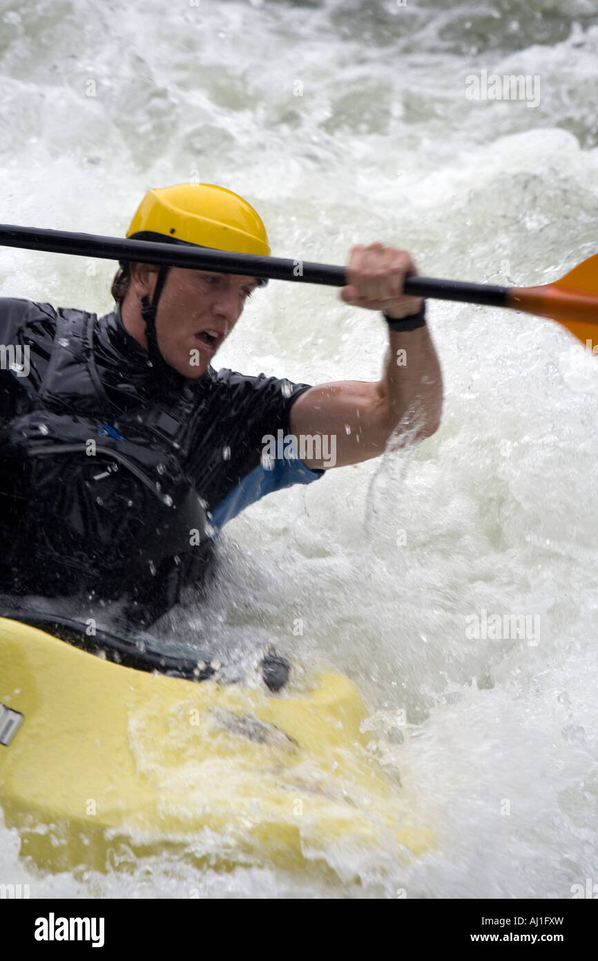 Cutting through whitewater rapid Stock Photo - Alamy