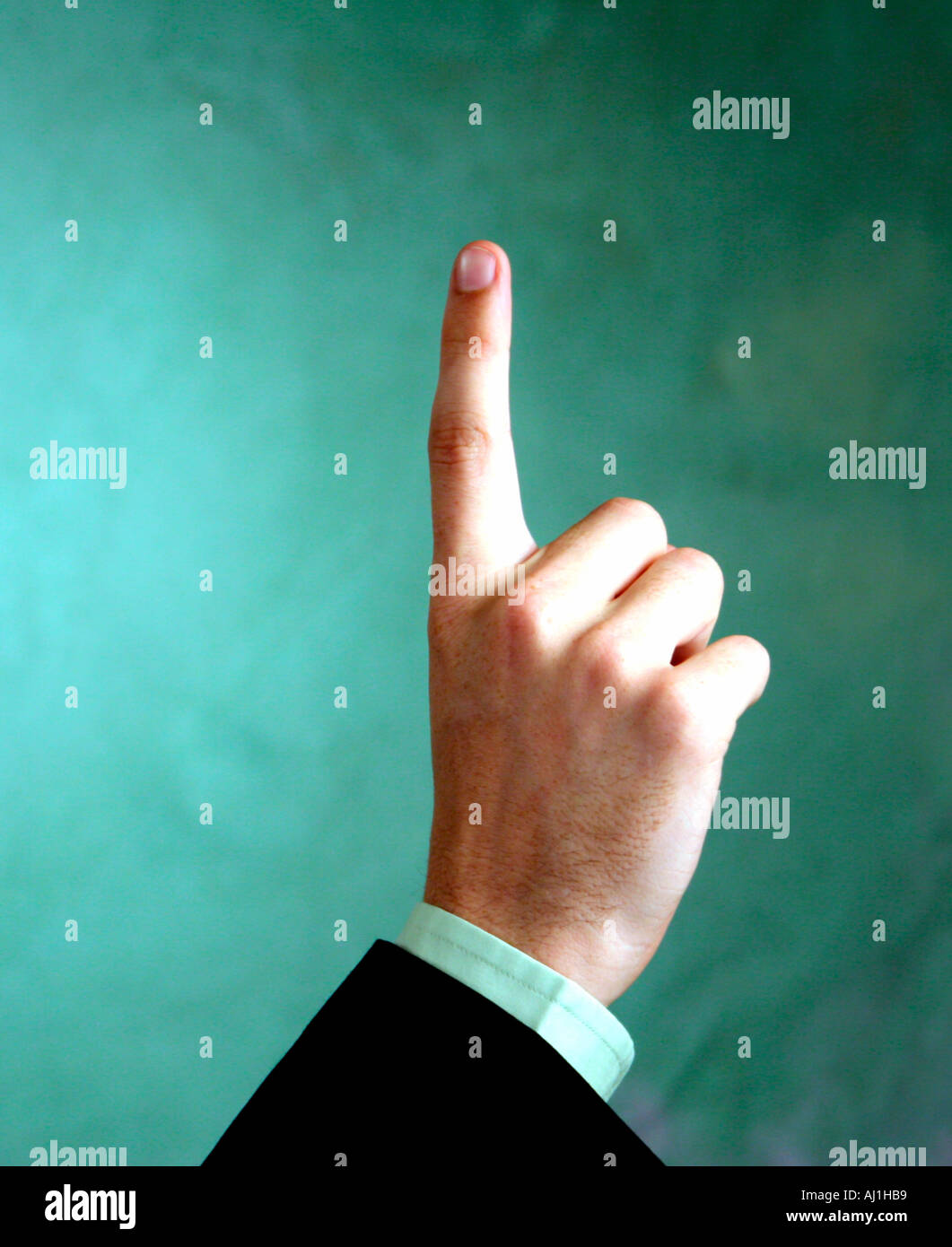 Mans Hand Pointing Finger Concept and Symbols Stock Photo - Alamy