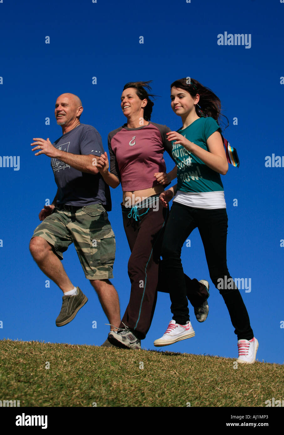 Family exercise outdoors Stock Photo - Alamy