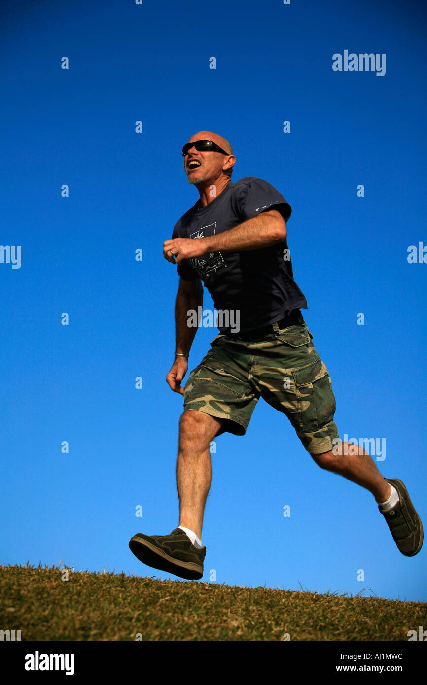 How a man runs hi-res stock photography and images - Alamy