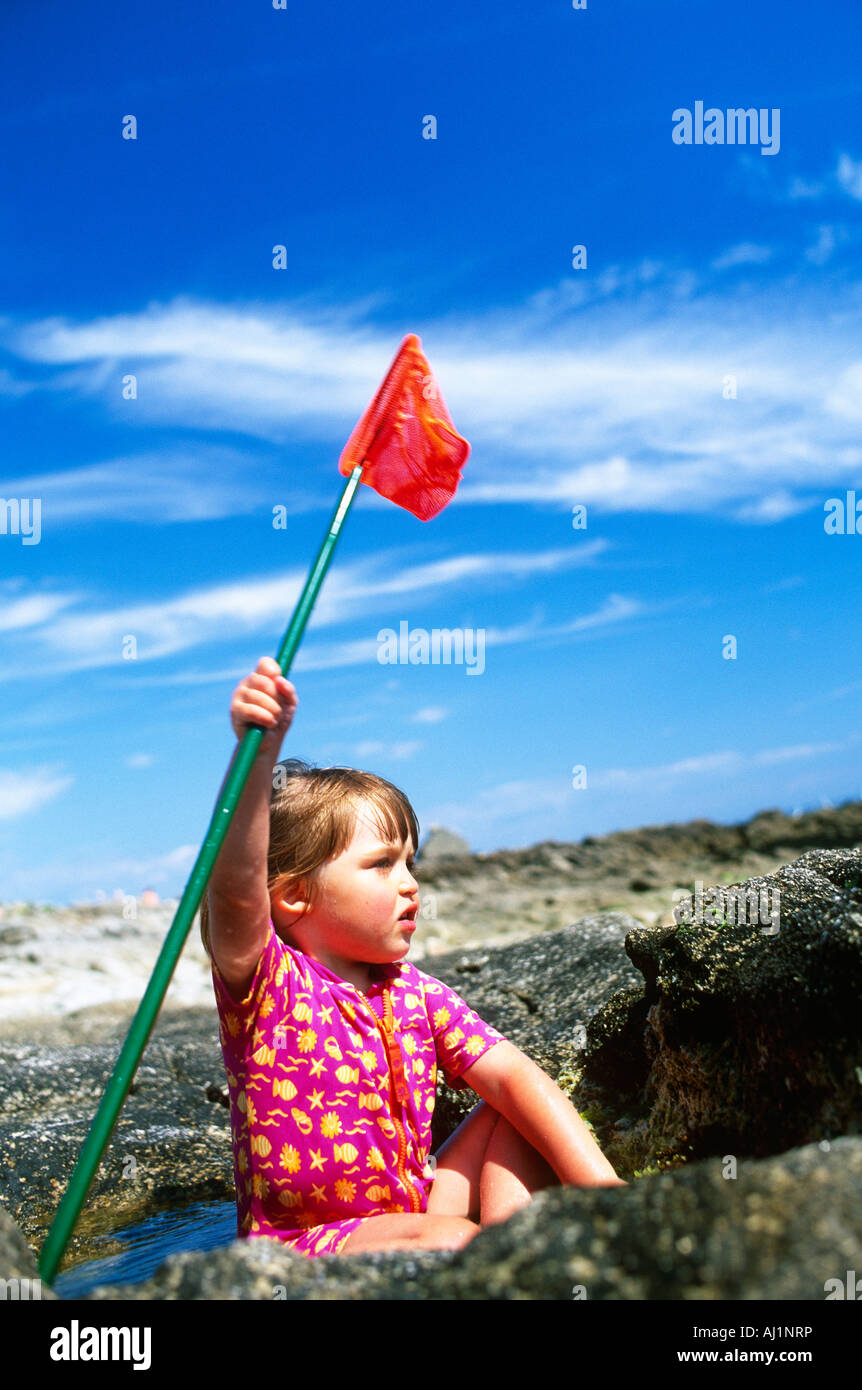 Playing in rock pool hi-res stock photography and images - Alamy