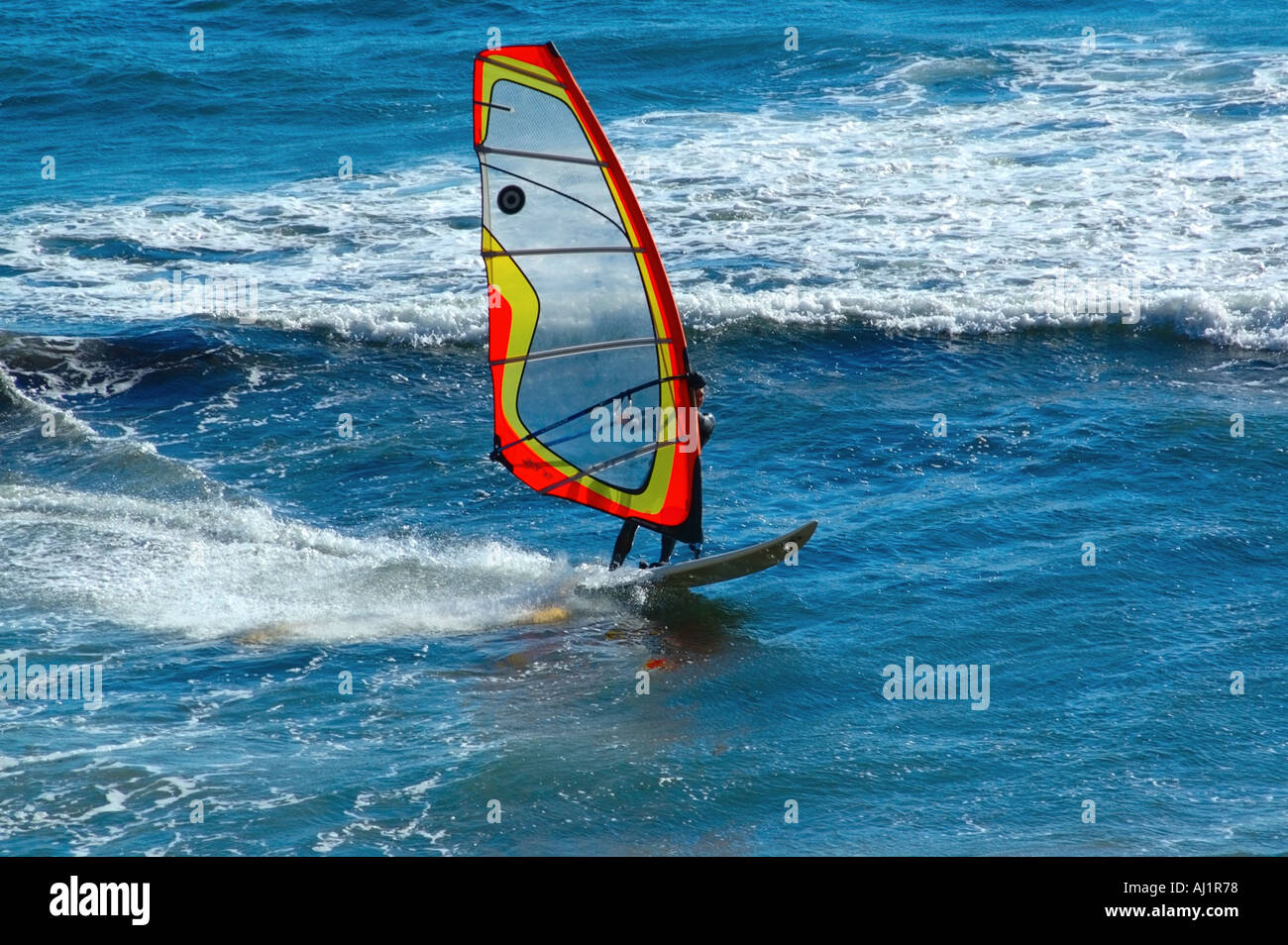 Wind surfer in the ocean Stock Photo - Alamy