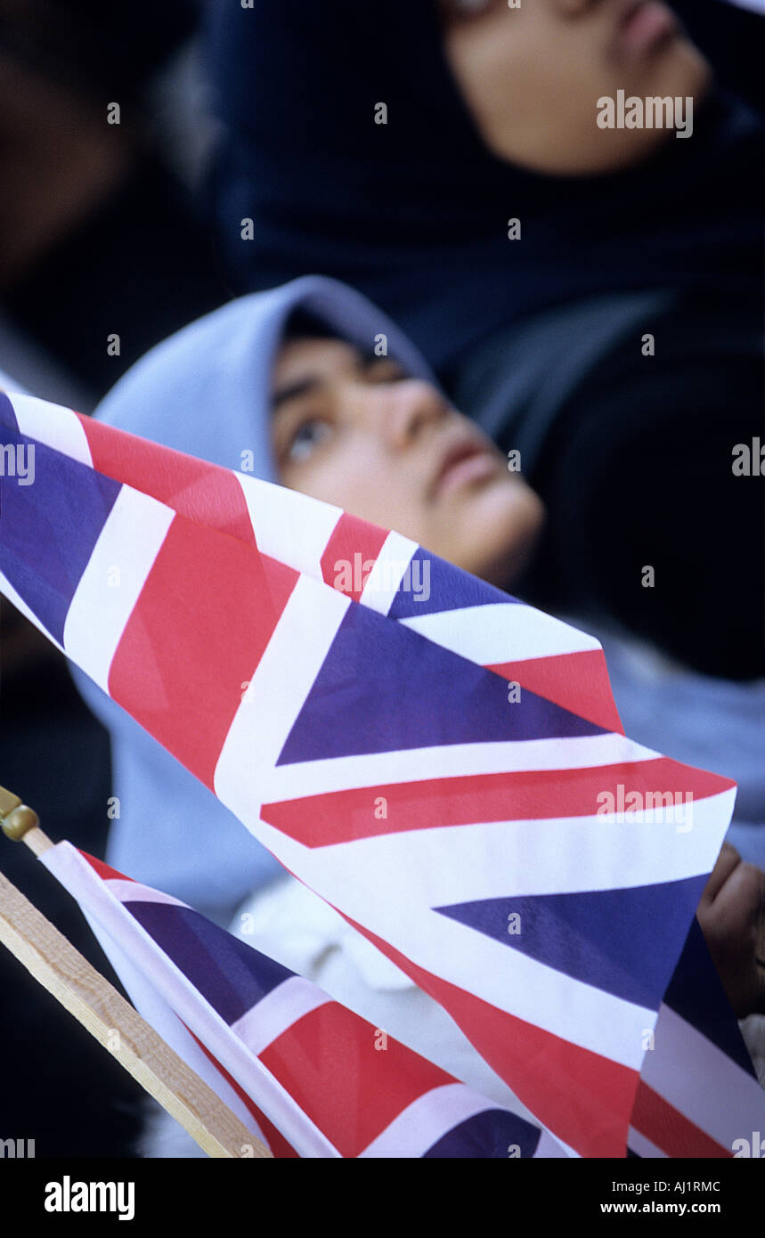 British muslims with british flag hi-res stock photography and images ...