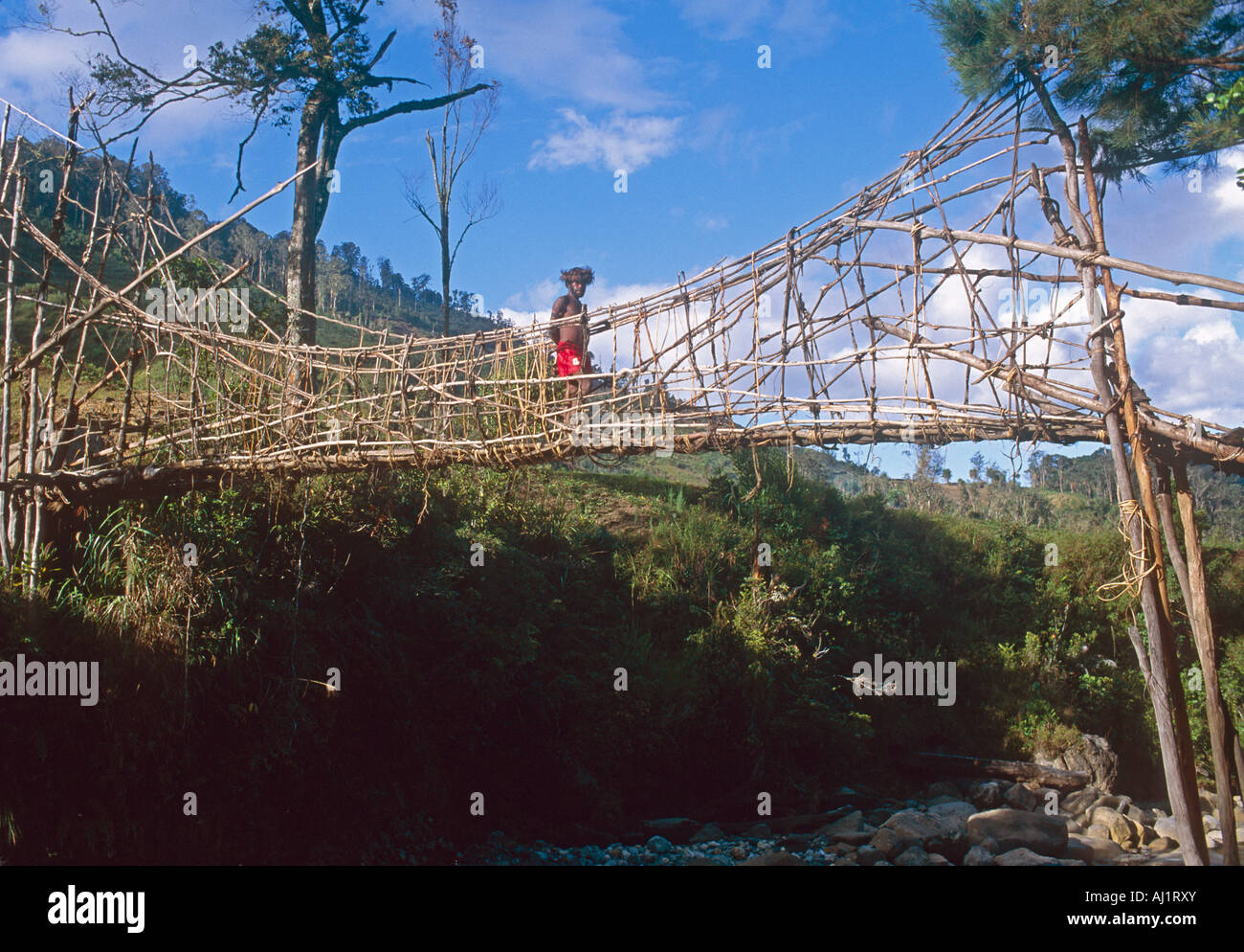Dani man crossing rope bridge hi-res stock photography and images - Alamy