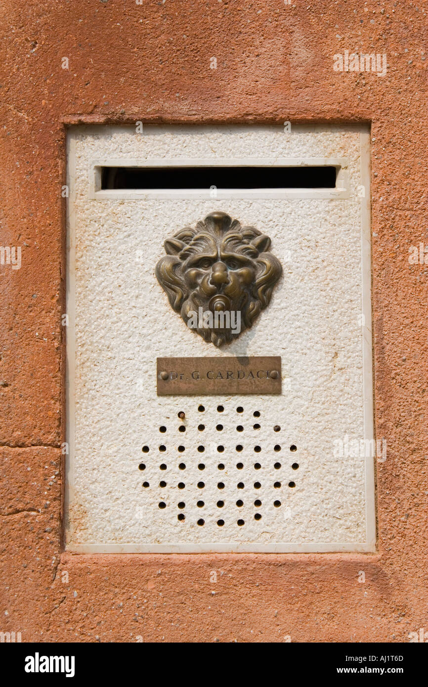 Combination letter slot doorbell nameplate and intercom on residential ...