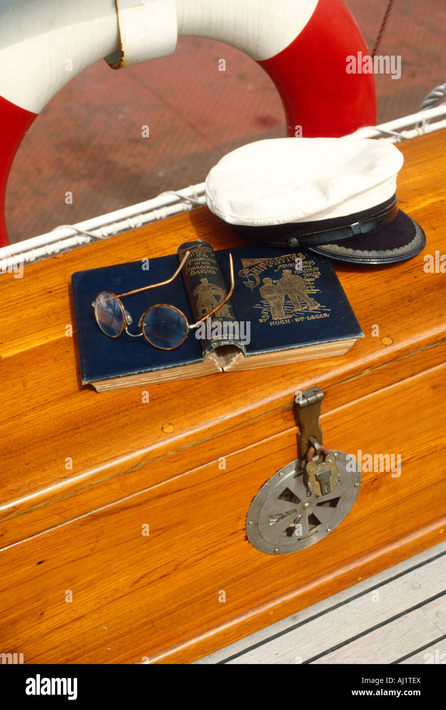 sailors cap book spectacles nautical ephemera Stock Photo - Alamy