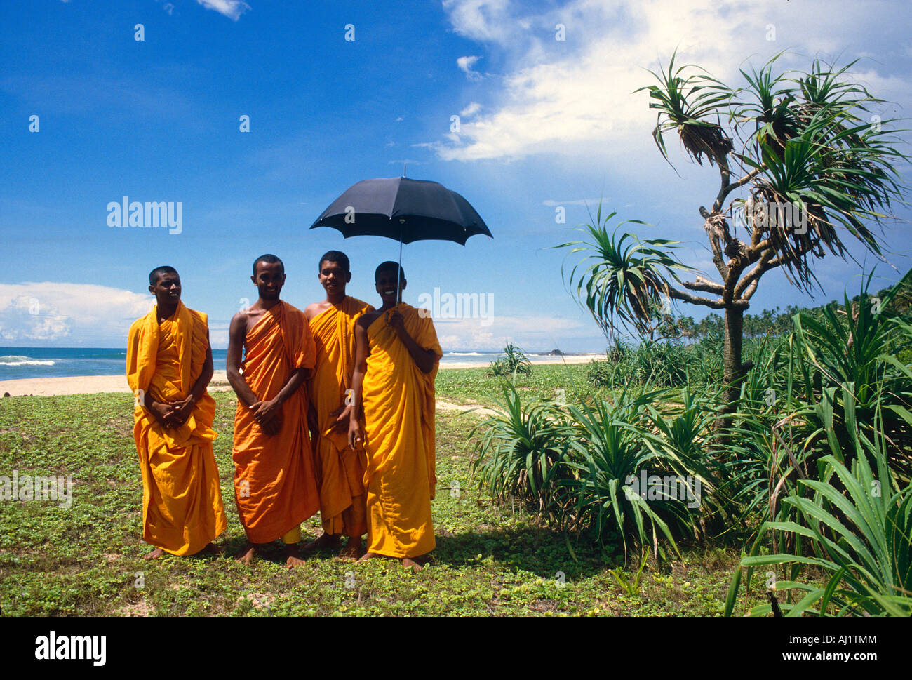 Buddhist monks sea Stock Photo - Alamy