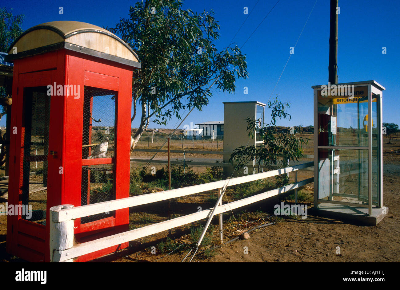 red telephone box and modern telephone box Stock Photo - Alamy