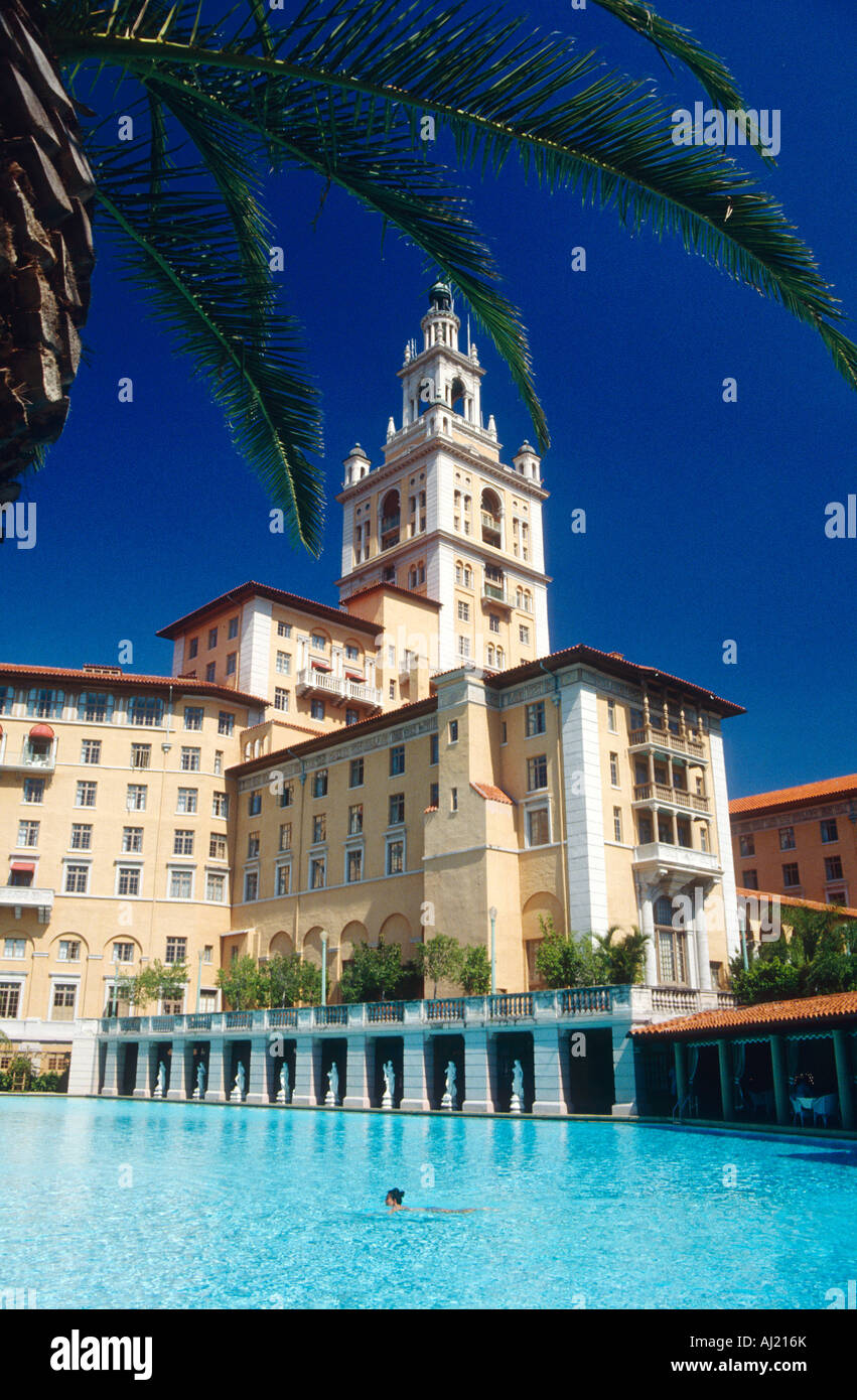 Biltmore hotel and swimming pool with palm tree Stock Photo - Alamy