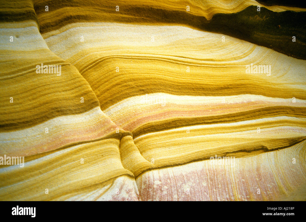 yellow striped sand coloured rock strata Stock Photo - Alamy