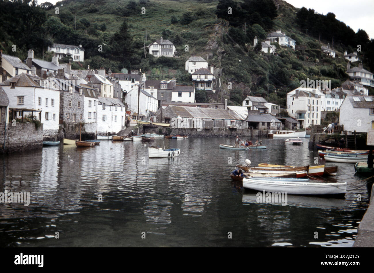 river/harbour surrounded by little old cottages which are standing on ...