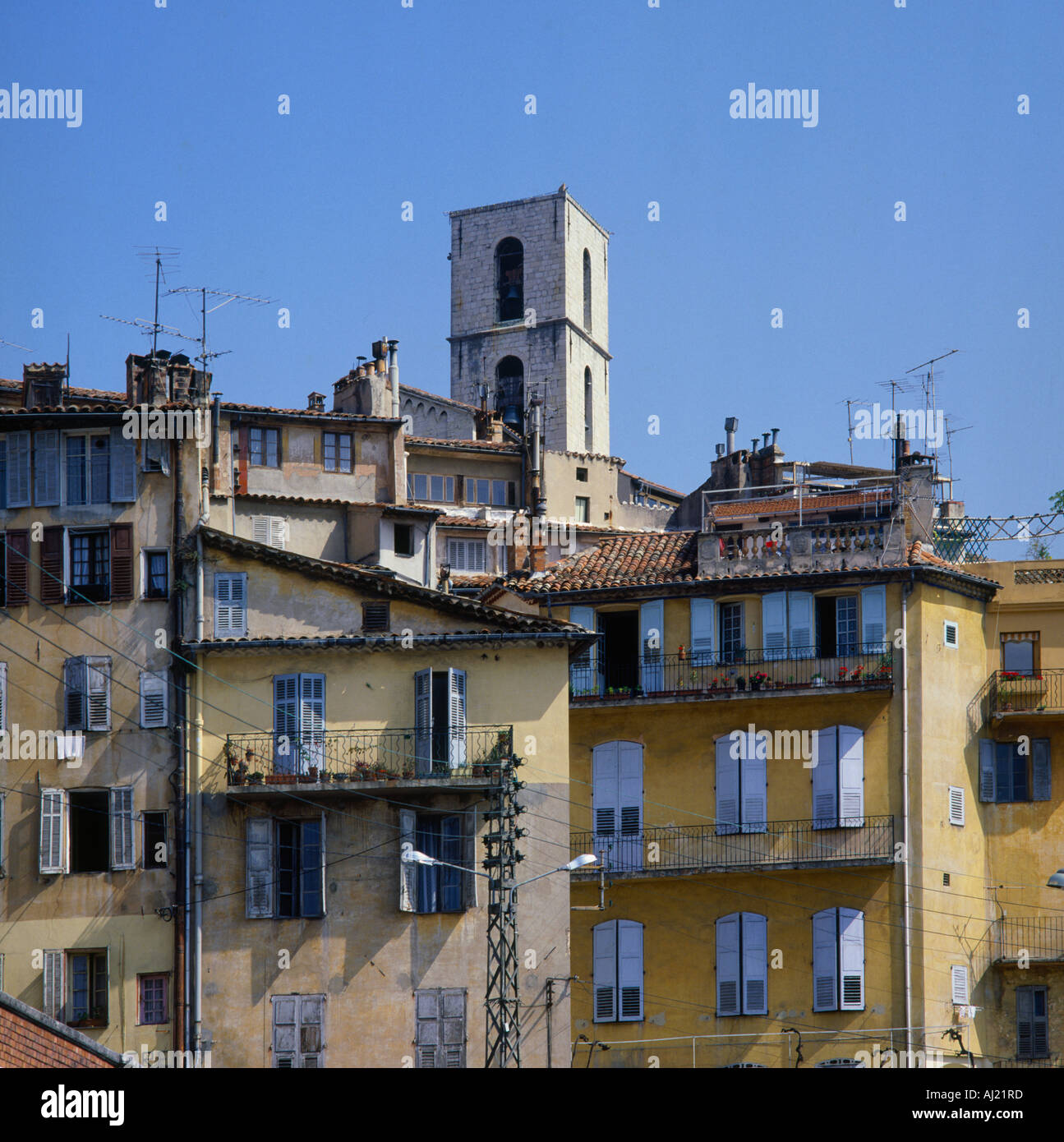 A classic French town scene of a mass of closely grouped tall buildings ...