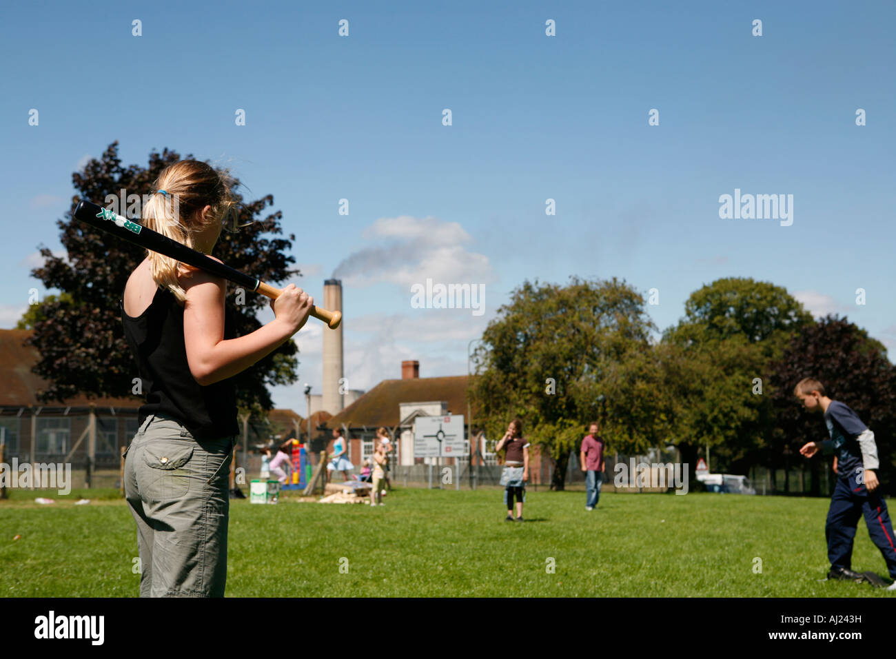 Girl playing baseball Stock Photo - Alamy
