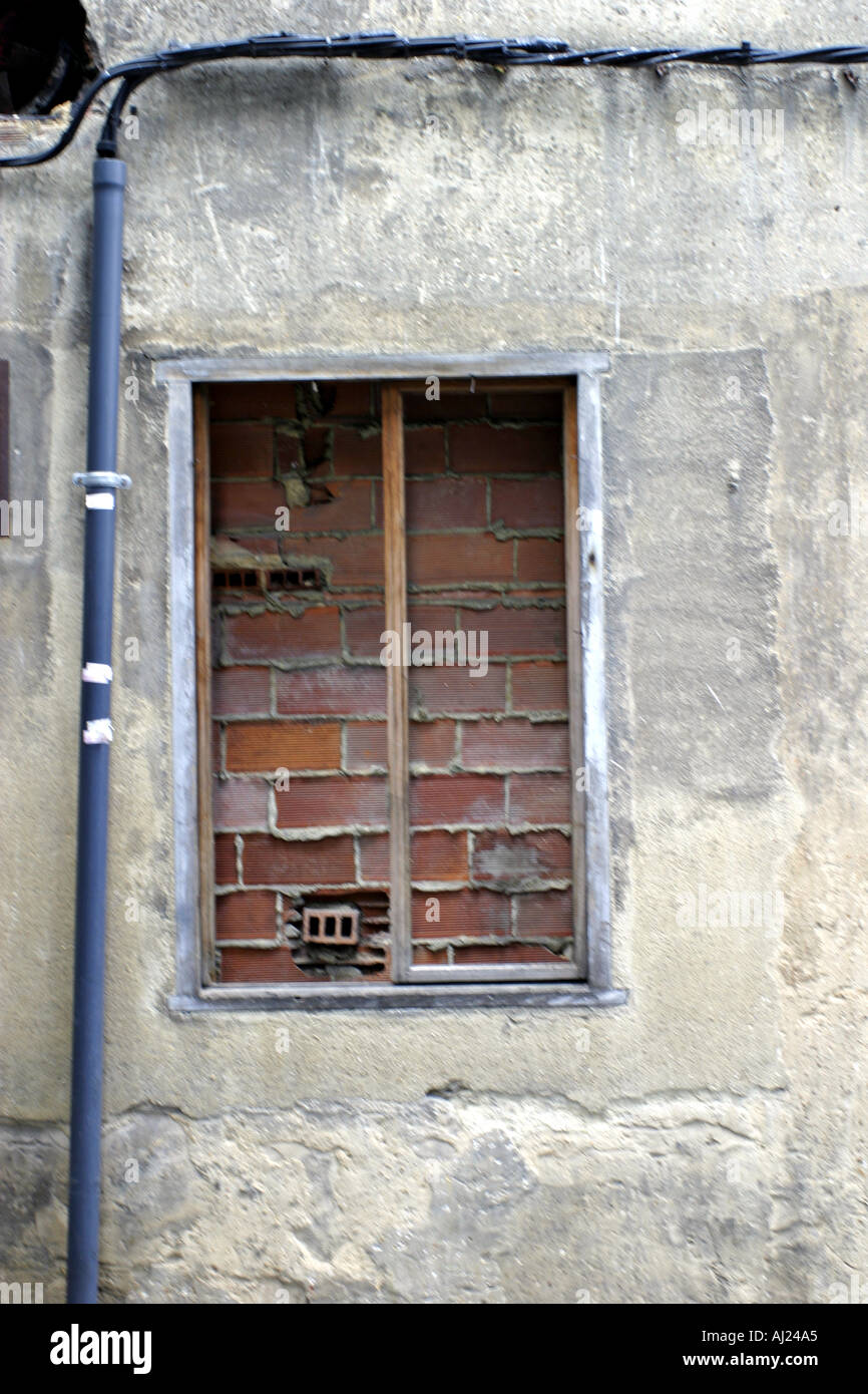 Window blinded by a brick wall Stock Photo - Alamy