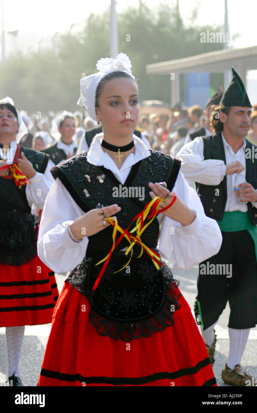 Teenage Asturian Spanish dancer with castinets or castañuelas during a ...